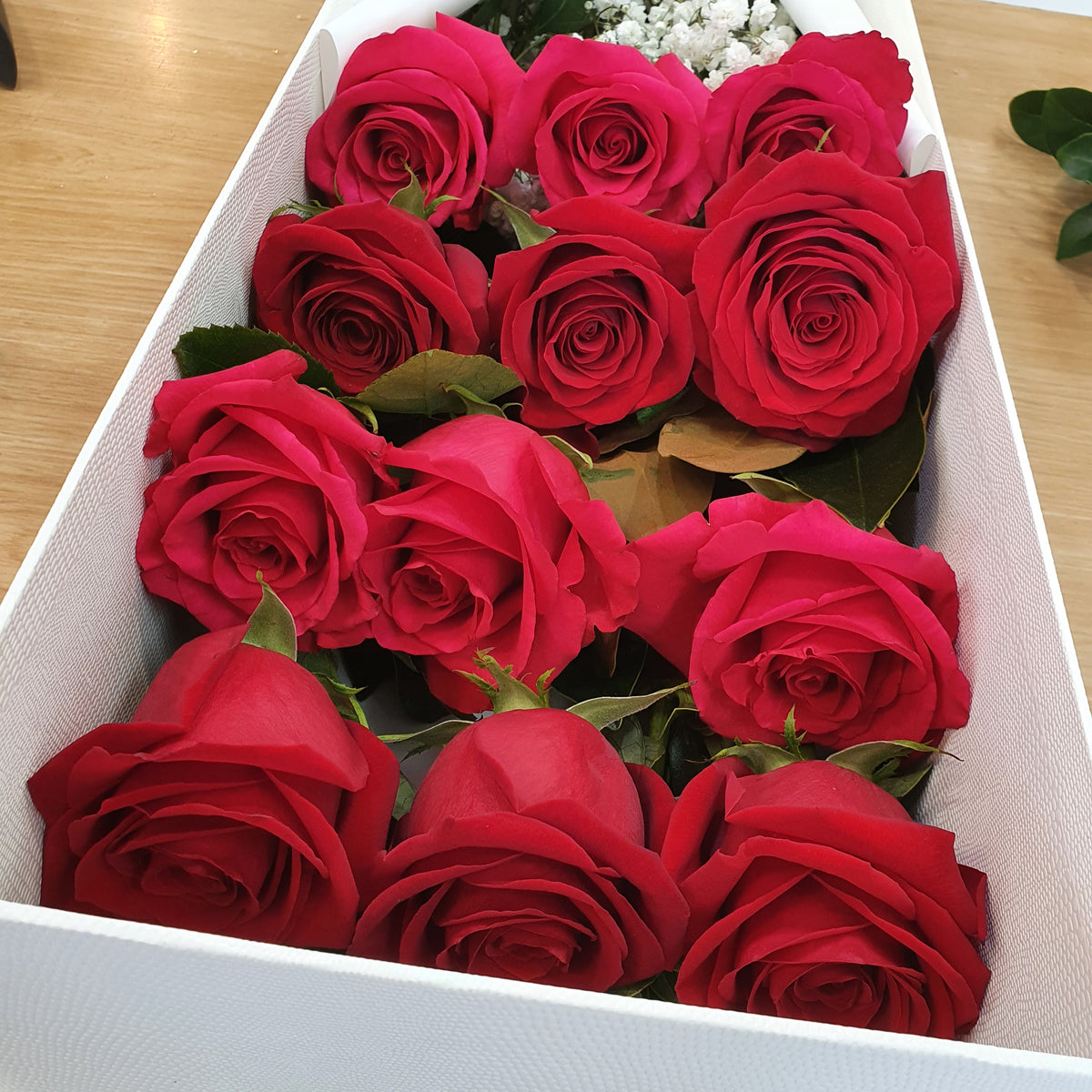 12 Premium Colombian Roses in a Flat Presentation Box
